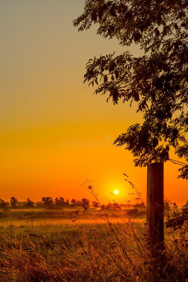 Countryside Sunrise Over the Fields Showing the Dramatic Colors in the ...