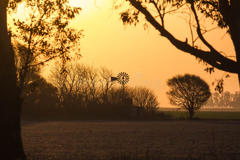 Countryside in the sunset stock image. Image of alternative - 75820505