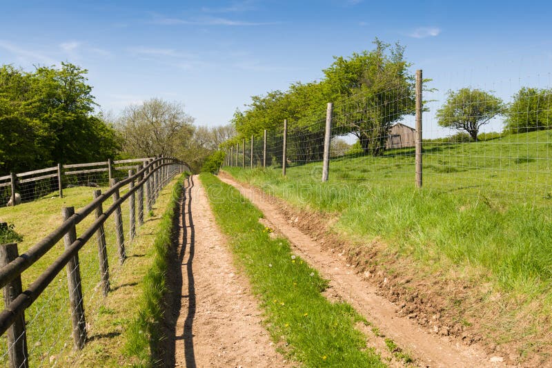 Countryside Track and Sunbeams Stock Photo - Image of tranquil, hiking ...