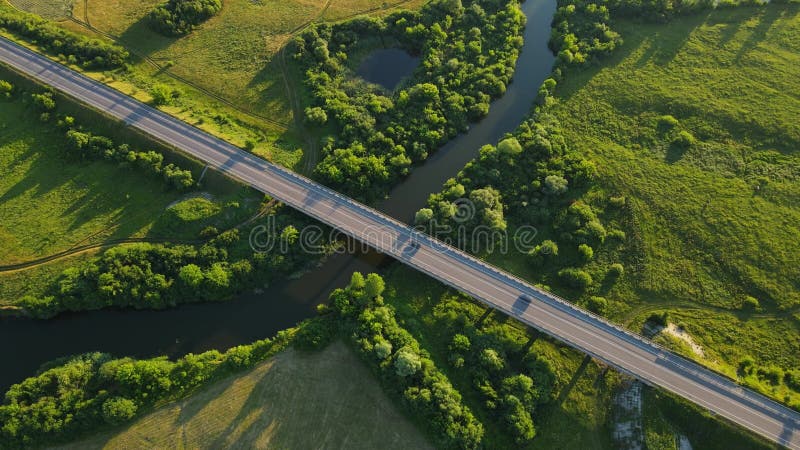 Countryside. a Wide Canal that Flows between Fields and Forests and a ...