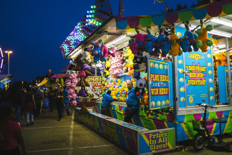 County Fair at Night, Games on the Midway Editorial Photo - Image of ...