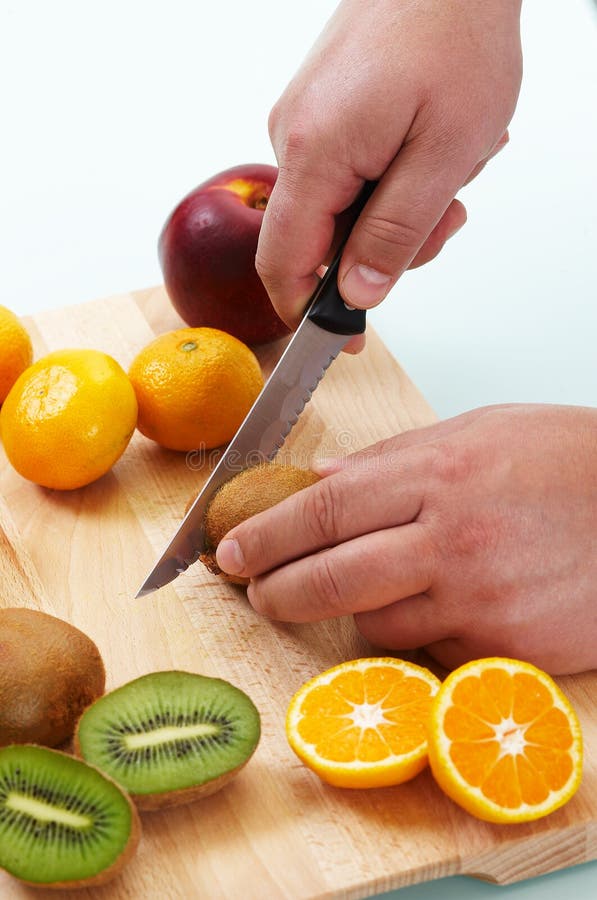 Couper différents fruits image stock. Image du sain, tropical - 7268409