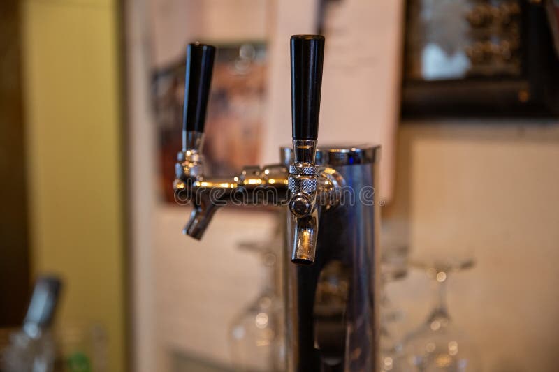 Couple of alcohol taps stock photo. Image of refreshment - 287785056