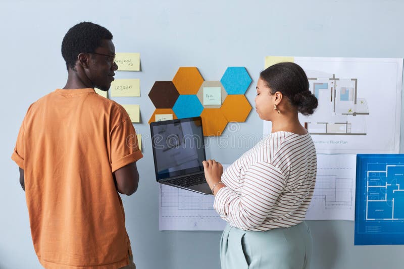 Couple of Architects Using Laptop at Work Stock Image - Image of ...