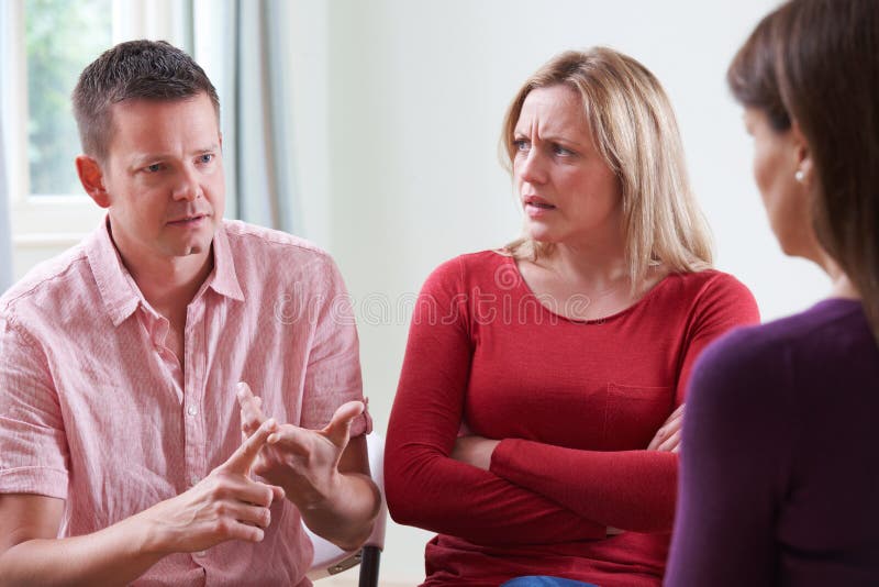 Couple Arguing in Front of Relationship Counsellor Stock Photo - Image ...