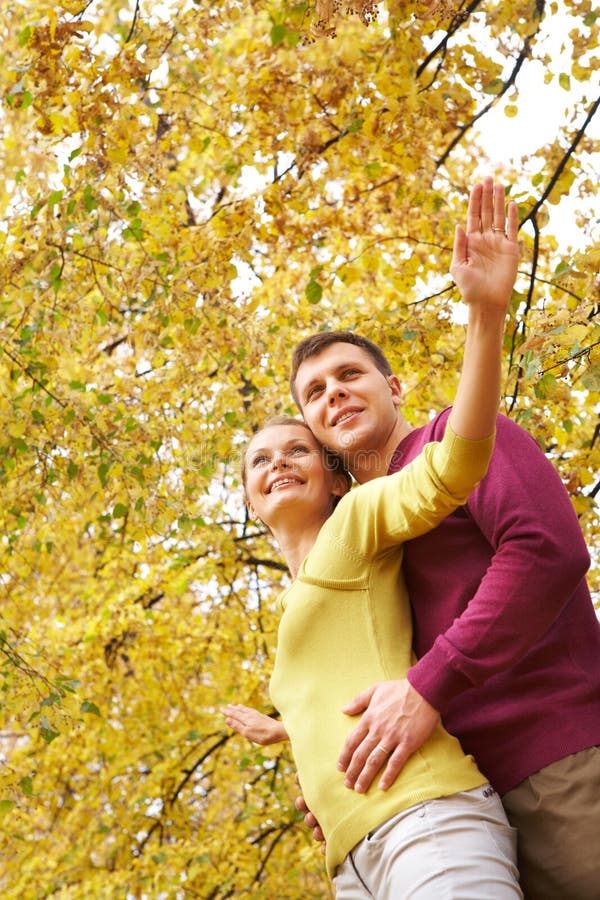 Couple in autumn stock photo. Image of outstretched, outdoors - 24237596