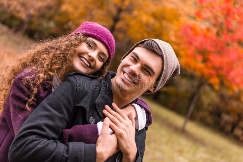 Couple on autumn walk stock photo. Image of happy, outdoors - 61486106