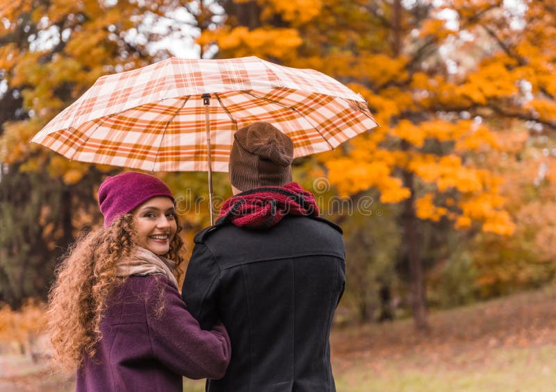 Couple on autumn walk stock image. Image of beautiful - 61486157