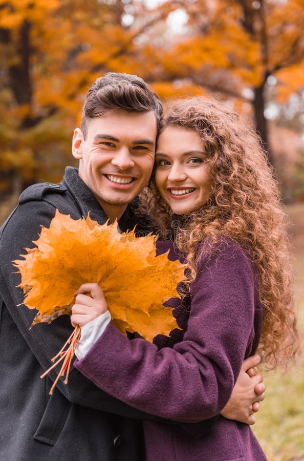 Couple on autumn walk stock image. Image of handsome - 61486317