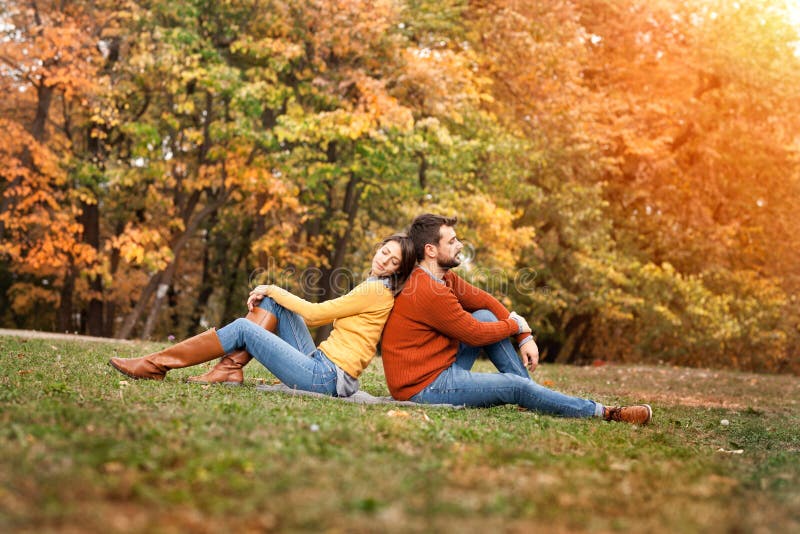 Couple back to back stock image. Image of october, handsome - 153641003