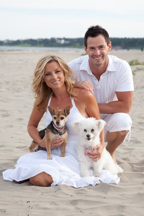 Couple with dogs stock photo. Image of couple, identity - 35338640