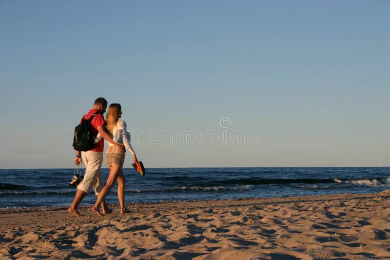 Couple during a Beach Stroll Stock Image - Image of emotions, love: 248857