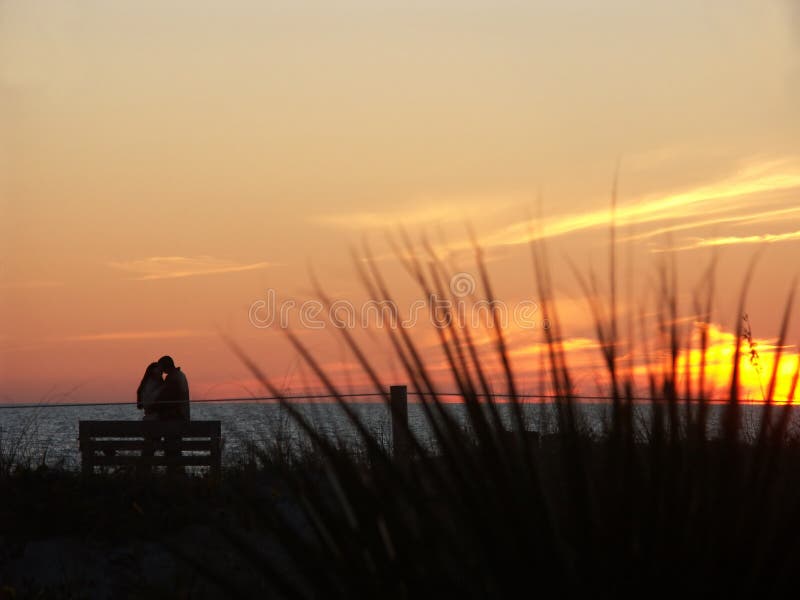 Sunset Hugs Reflected stock image. Image of seaside, glorious - 346517