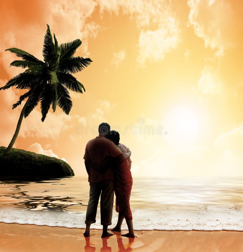 Couple on the Beach at Sunset Stock Photo - Image of field, destination ...