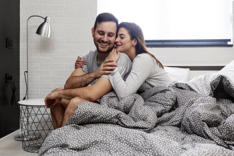 Couple in Bed Early in the Morning Stock Photo - Image of relations ...