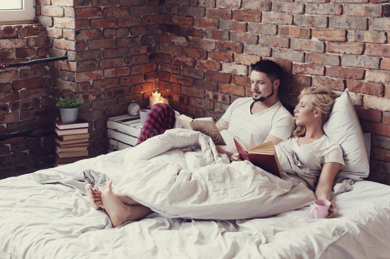 Couple in bed stock image. Image of male, pajamas, bedroom - 69022127