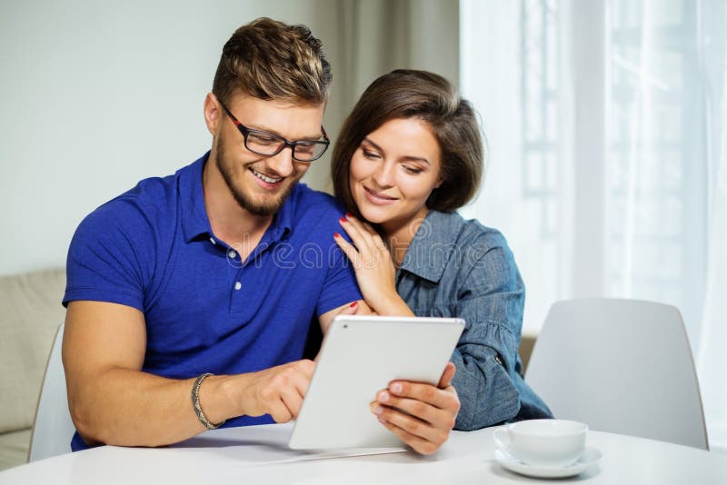 Couple Behind Table at Home Stock Photo - Image of family, friendship ...