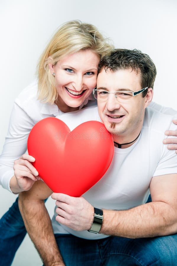 Couple with Big Heart in Their Hands Stock Photo - Image of happy ...