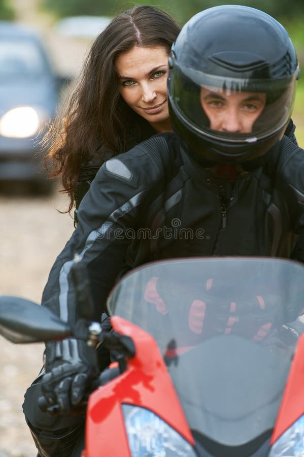 Couple on bike stock photo. Image of biker, handsome - 25985698