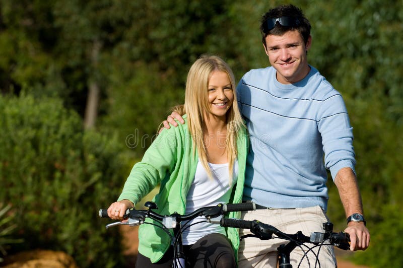 Couple on Bikes stock image. Image of young, bike, countryside - 5317421