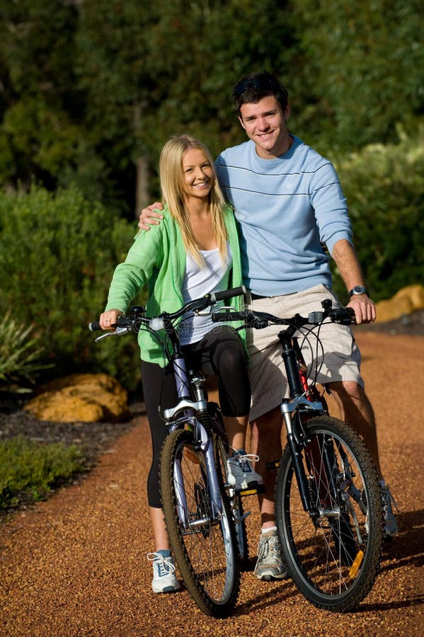 Couple on Bikes stock image. Image of young, bike, countryside - 5317421