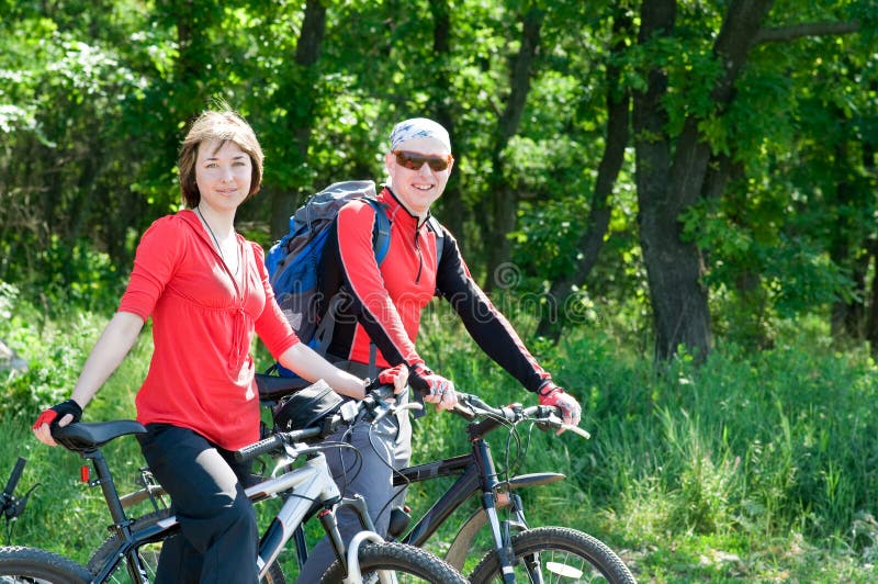 Summer Bike - Young Sportive Couple in Meadow Stock Image - Image of ...