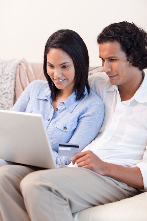 Couple Booking Holidays Online Together Stock Image - Image of indoors ...