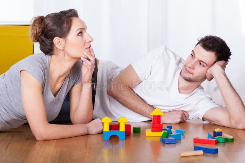 Happy Couple Playing Chess on Floor in Living-room Stock Photo - Image ...