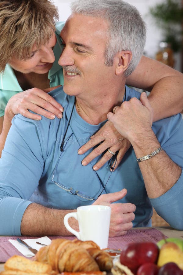Couple at breakfast time stock image. Image of nutrition - 24231015