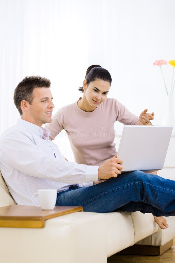 Couple browsing internet stock photo. Image of connectivity - 8503478