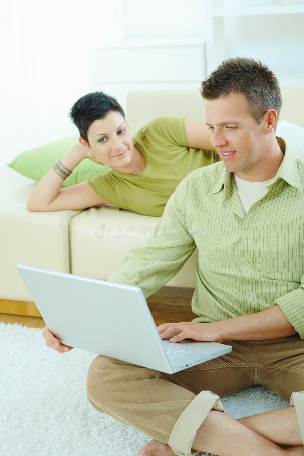 Couple Browsing Internet at Home Stock Image - Image of caucasian ...