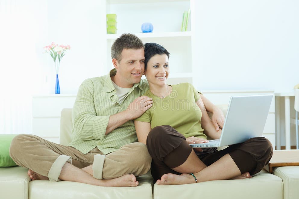 Couple Browsing Internet at Home Stock Image - Image of caucasian ...
