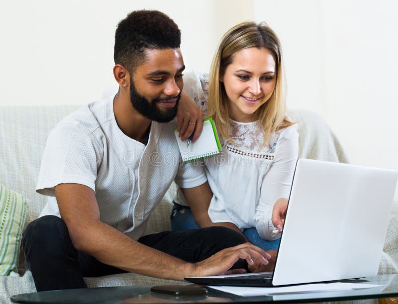 Couple Browsing Web at Home Stock Photo - Image of casual, caucasian ...