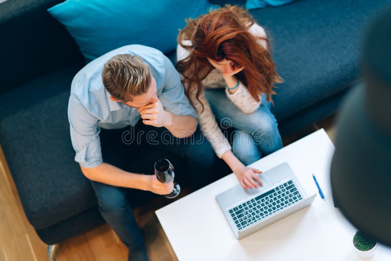 Couple Browsing Web Together in Living Room Stock Image - Image of ...