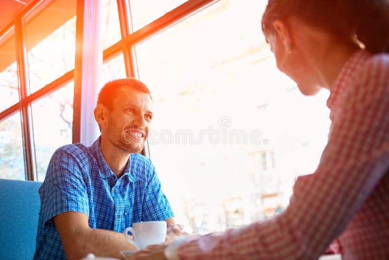 Couple in cafe stock photo. Image of sitting, beautiful - 72145222