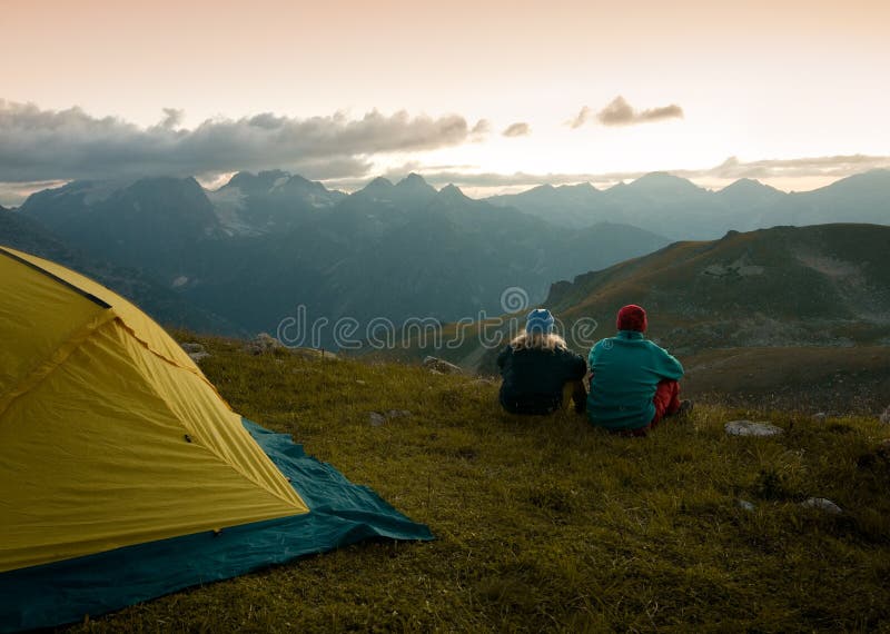 Couple camping at night stock photo. Image of hike, night - 19439696