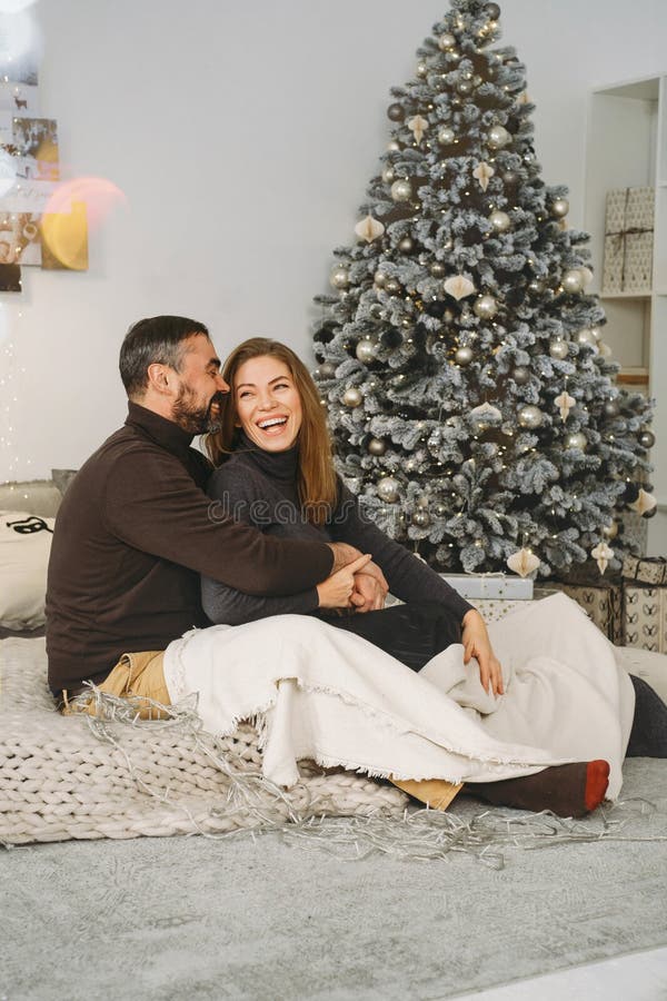 Couple Celebrating Romantic Christmas Eve at Home Stock Image - Image ...