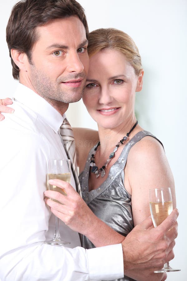 Couple with champagne, Portrait of a couple with