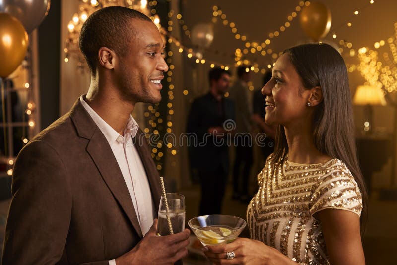 Couple Chat As they Enjoy Cocktail Party Together Stock Photo - Image ...