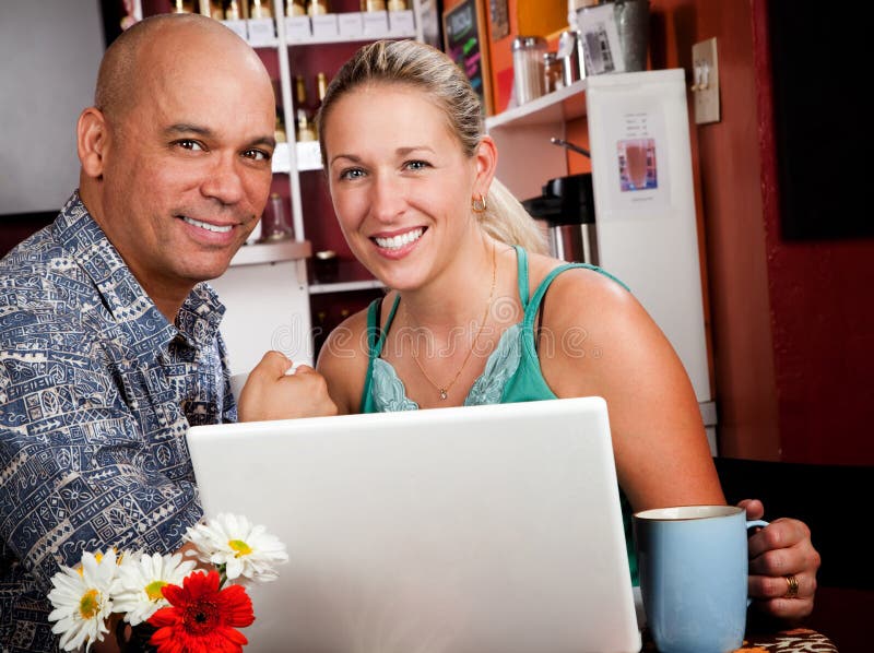 Couple in Coffee House with Laptop Computer Stock Photo - Image of ...