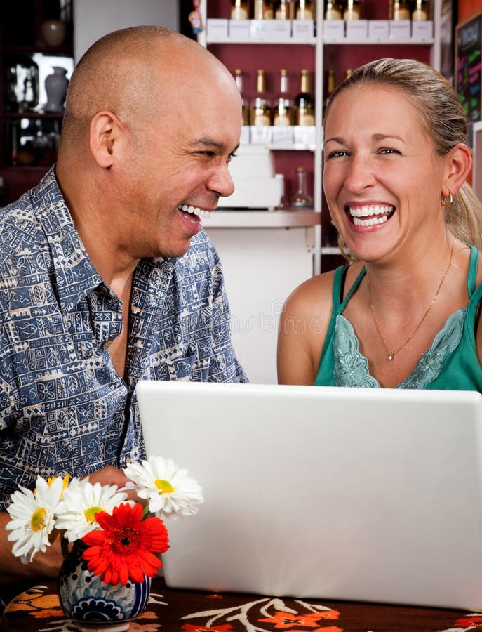 Couple in Coffee House with Laptop Computer Stock Photo - Image of ...