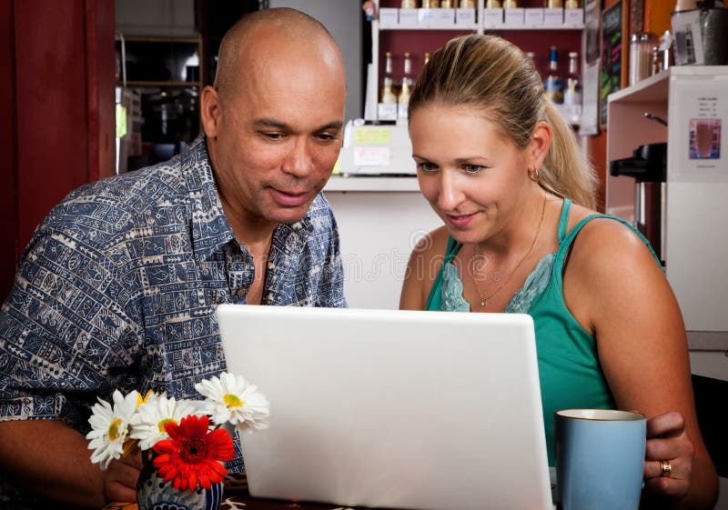 Couple in Coffee House with Laptop Computer Stock Image - Image of ...