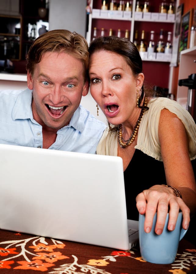 Couple in Coffee House with Laptop Computer Stock Photo - Image of cafe ...