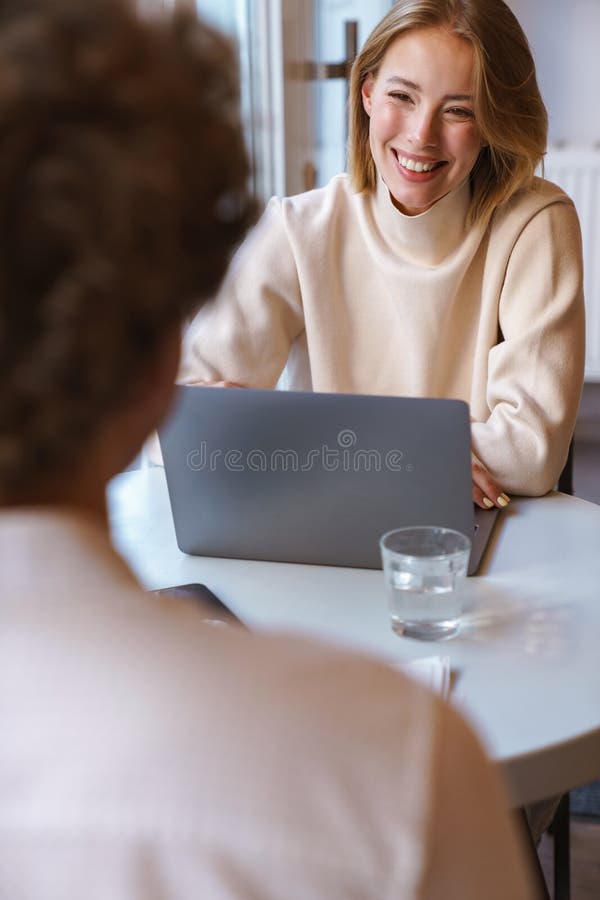 Couple Colleagues Sit in Cafe Using Laptop Computer Stock Image - Image ...