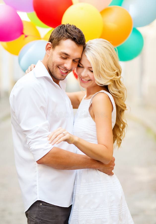 Couple With Colorful Balloons Kissing In The Park Stock Image Image