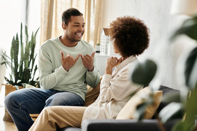 A Couple Communicates Using Sign Language Stock Image - Image of ...
