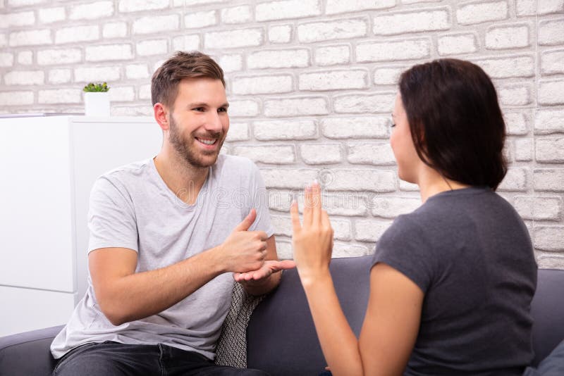 Couple Communicating with Sign Languages Stock Photo - Image of hands ...