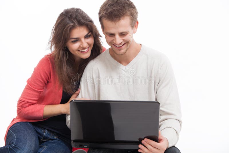 Couple at the computer stock image. Image of communications - 48752319