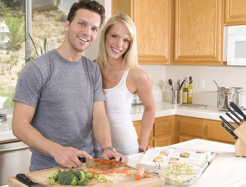 Couple cooking stock photo. Image of adorable, embracing - 10049064