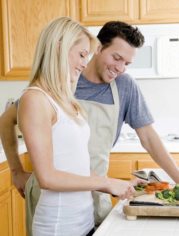 Couple Cooking Together in Kitchen Stock Photo - Image of adult ...